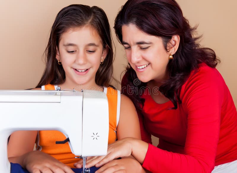 Mother and Daughter Sewing Together Stock Image - Image of fabric ...