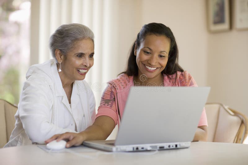 Mother and Daughter Sharing Computer Stock Photo - Image of american ...