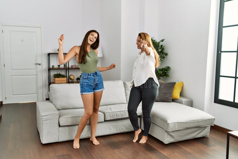 Mother and Daughter Smiling Confident Dancing at Home Stock Image ...