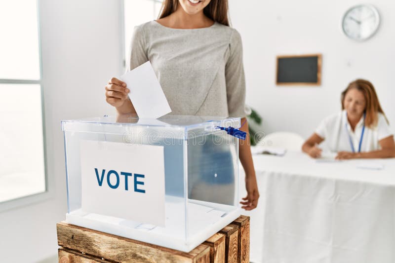 Mother and Daughter Smiling Confident Voting at Electoral College Stock ...