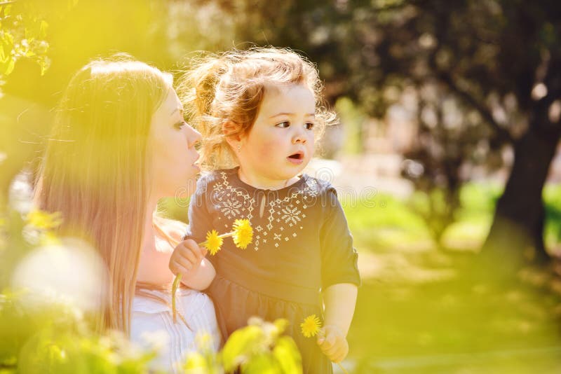 Mother and Daughter in Spring Stock Image - Image of green, girl: 214907903