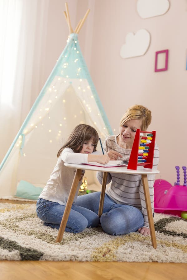 Solving math problems stock photo. Image of home, nursery - 112286378