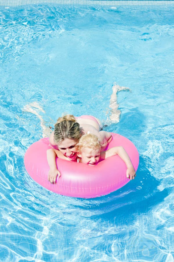 Mother and Daughter in Swimming Pool Stock Photo - Image of relaxing ...
