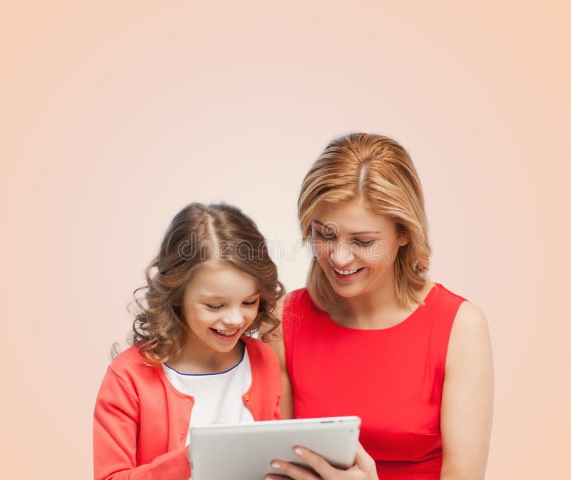 Mother and Daughter with Tablet Pc Computer Stock Photo - Image of ...