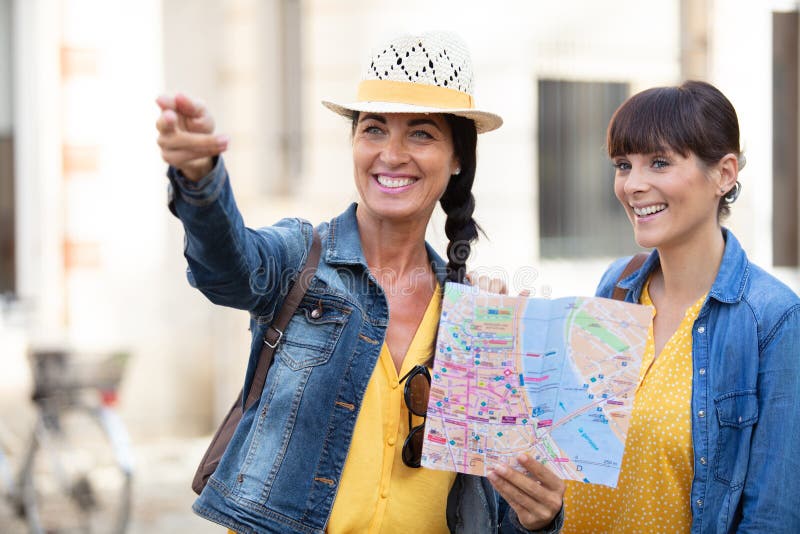 Mother with Daughter Travel Women with Map Stock Image - Image of happy ...
