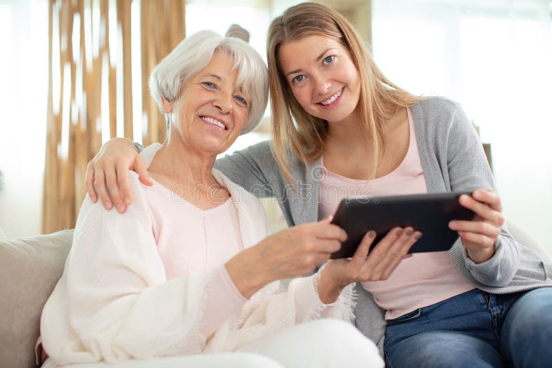 Mother and Daughter Use Tablet at Home Stock Photo - Image of happy ...