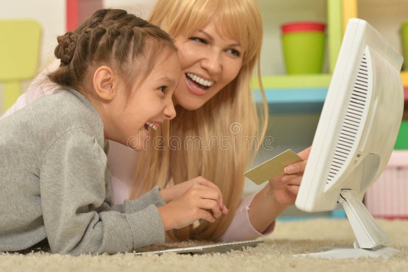 Mother and Daughter Using Computer Stock Photo - Image of female ...