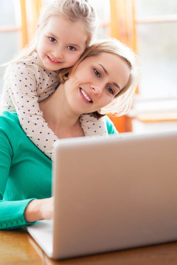 Mom and Baby with Computer Working from Home Stock Image - Image of ...