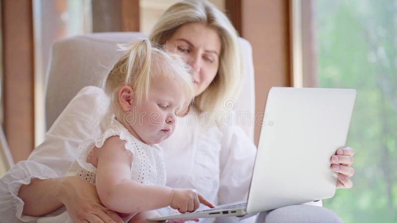 Mother and Daughter Using Laptop at Home Stock Footage - Video of home ...