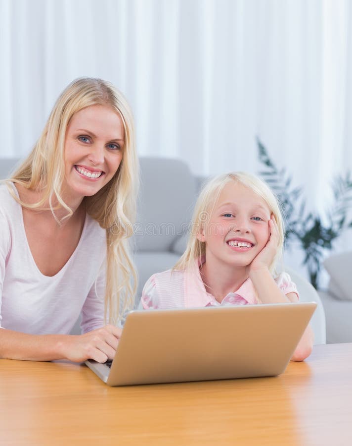 Mother and Daughter at Home Using Computer Stock Photo - Image of ...
