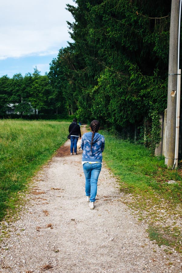 Mother and Daughter Walk Along the Path Stock Image - Image of together ...