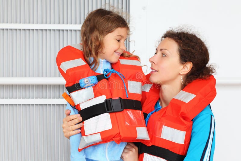 Mother and Daughter Wearing in Life Jacket Stock Photo - Image of safe ...