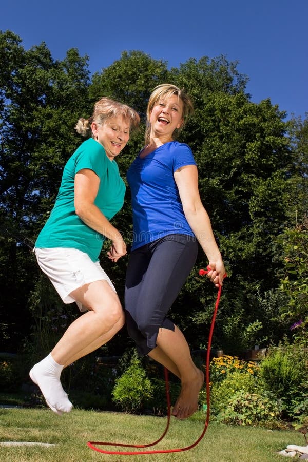 Mother and Daughter Wit a Skipping Rope Stock Photo - Image of aged ...