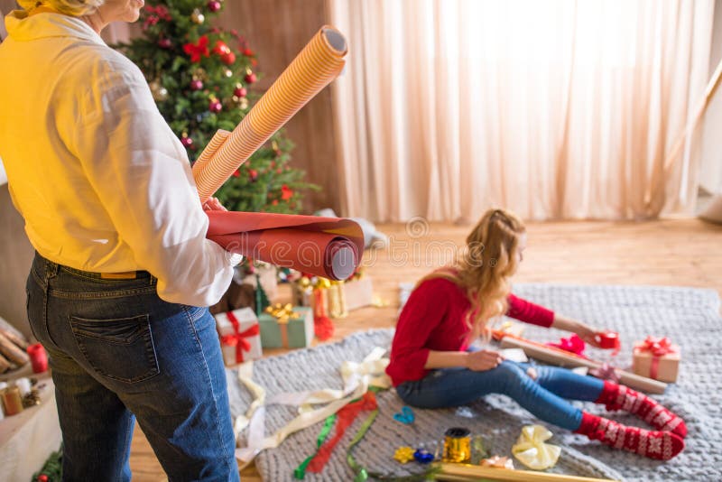Family wrapping gift boxes stock image. Image of lifestyle - 89645821