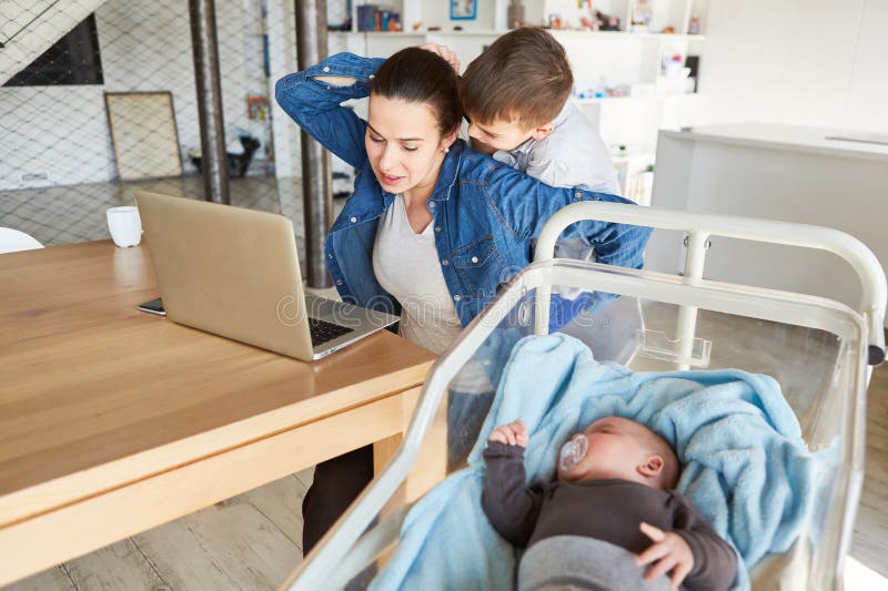 Mother is Disturbed by Her Son on the PC in the Home Office Stock Image ...