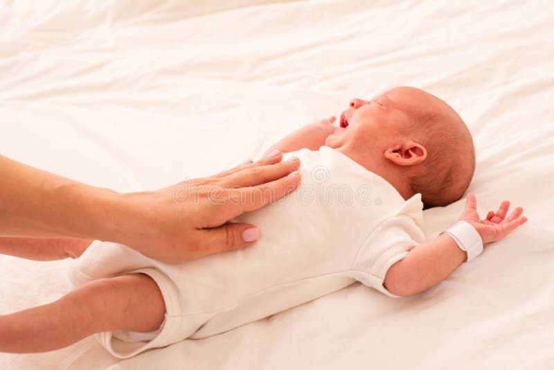 Mother is Doing Belly Massage for Newborn Stock Photo - Image of ...