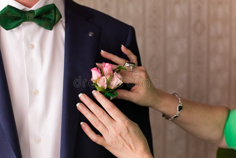 Mother Dresses To the Groom a Buttonhole Stock Image - Image of bride ...