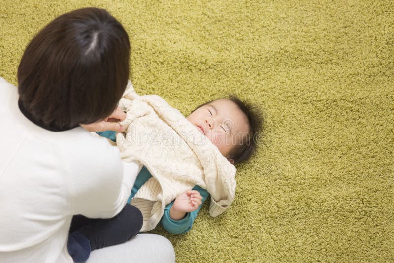 Infants disliking clothes stock photo. Image of little - 169949828