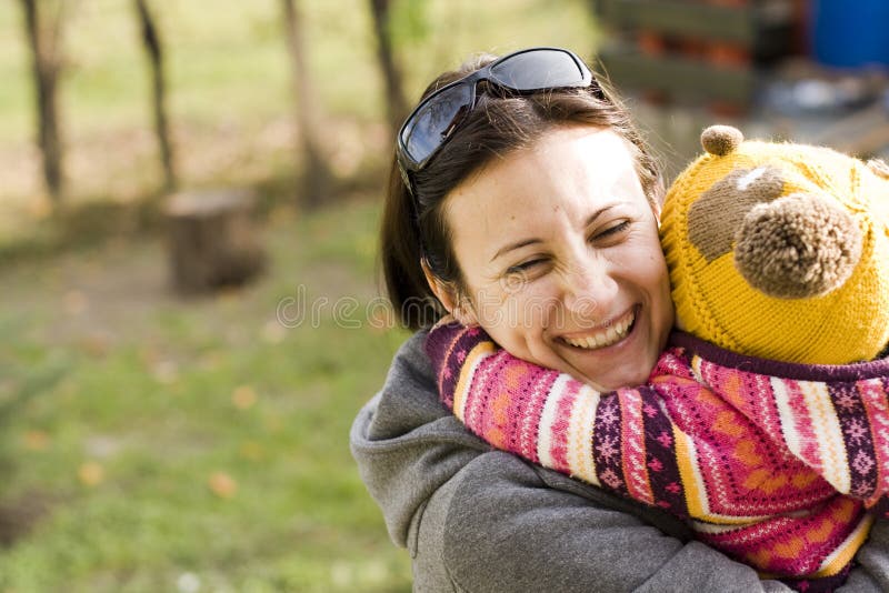 Mother embracing her child stock photo. Image of embracing - 37574740