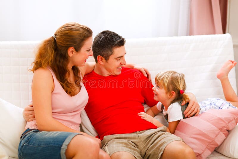 Mother and Father Talking with Daughter Stock Image - Image of living ...