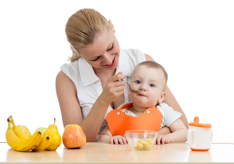 Mother feeding baby boy stock image. Image of feeding - 30741965