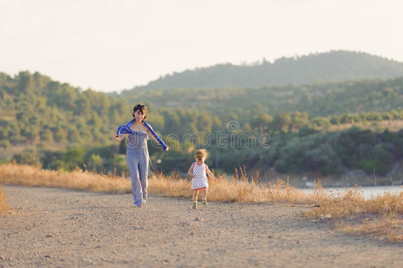 Mother Following Child stock image. Image of parent, adult - 43012641