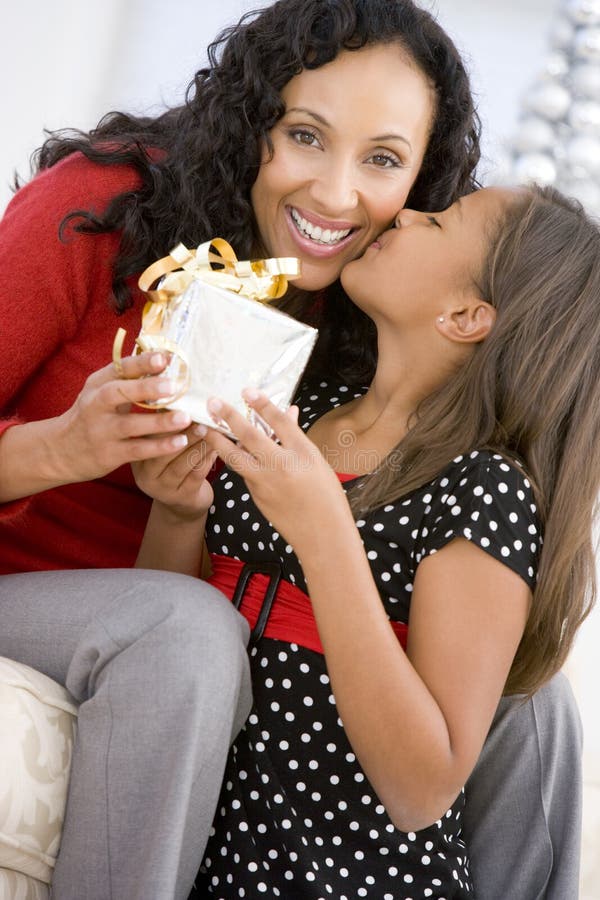 Mother Giving Daughter Her Christmas Present Stock Photo - Image of ...