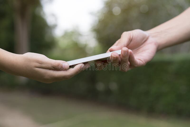 Mother Giving Her Child a Mobile Phone Stock Photo - Image of family ...