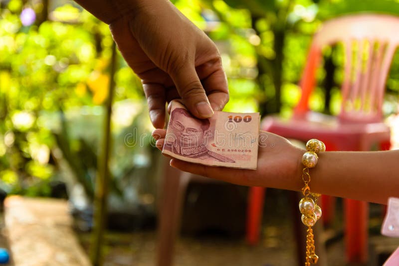Mother Giving Her Child Money Stock Photo - Image of value, giving ...