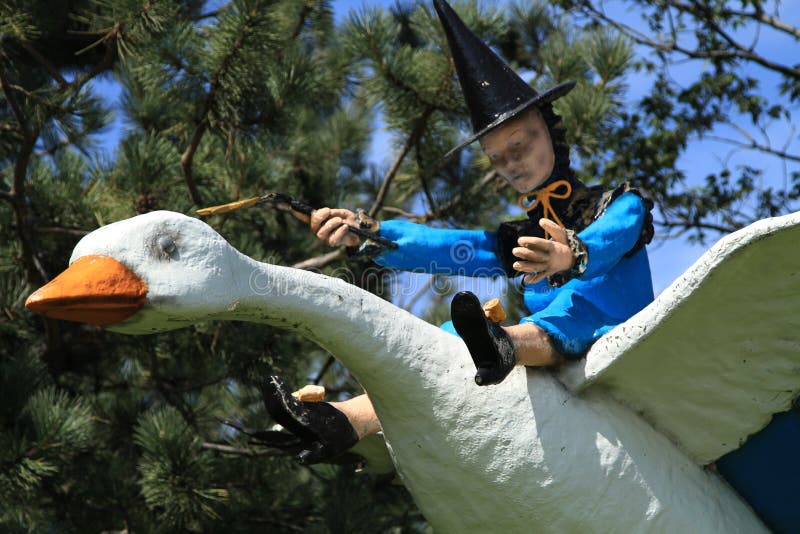 Mother Goose Statue Outdoors with Trees and Blue Sky Background. Stock ...