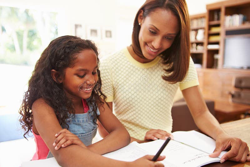 Mother Helping Daughter with Homework Stock Photo - Image of female ... Mother Helping Daughter with Homework Stock Photo - Image of female ...