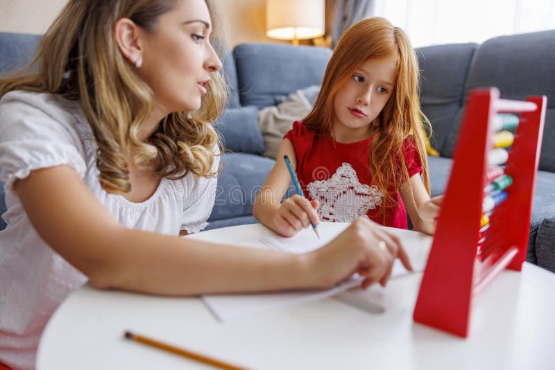 Mother Helping Daughter Study Math Stock Image - Image of calculation ...