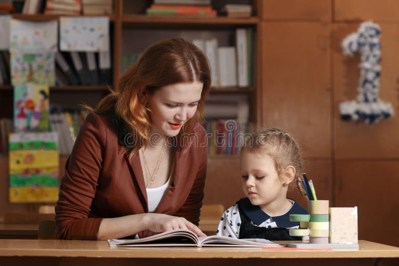 Mother Helping Kid after School. Preschooler Doing Homework with Help ...