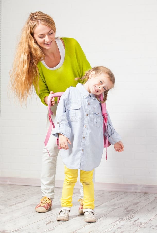 Mother Helps Her Daughter Get Ready for School Stock Photo - Image of ... Mother Helps Her Daughter Get Ready for School Stock Photo - Image of ...