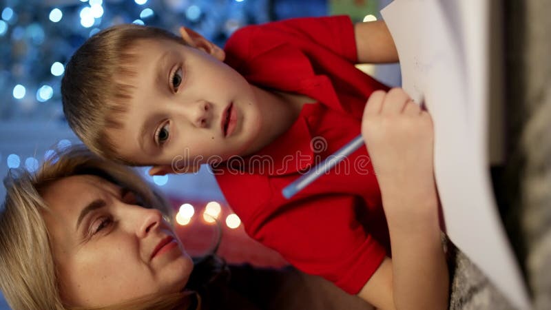 A Mother Helps Her Son Write a Letter To Santa. Stock Footage - Video ... A Mother Helps Her Son Write a Letter To Santa. Stock Footage - Video ...
