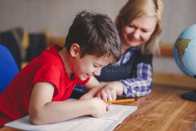 Mother Helps Son Doing Homework Stock Image - Image of family, study ...