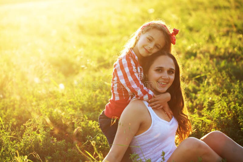 Mother with Her Child in Spring Field Stock Photo - Image of human ...