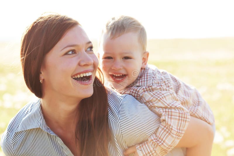 Mother with Her Child in Sunlight Stock Image - Image of face ...