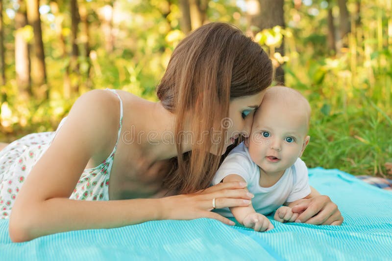 Boy Child Take Short Break Hunkering Down on Promenade, Rest Stock ...