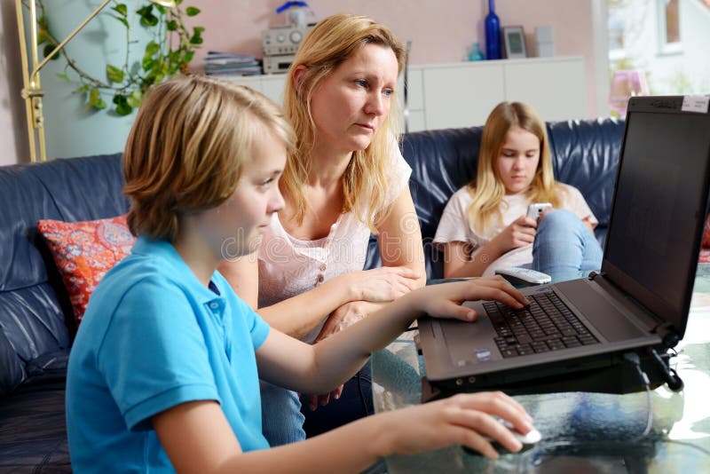 Mother and Her Children Using Computer Stock Photo - Image of education ...