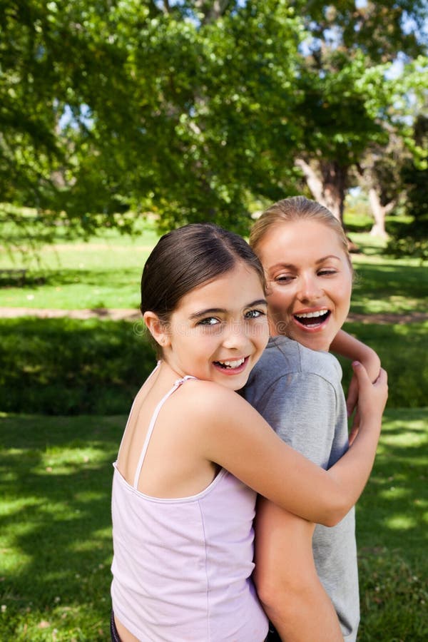 Mother and Her Daughter Laughing in the Park Stock Photo - Image of ...