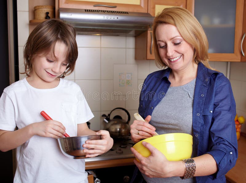 Mother and Her Son Cooking in the Kitchen Stock Photo - Image of bowl ...