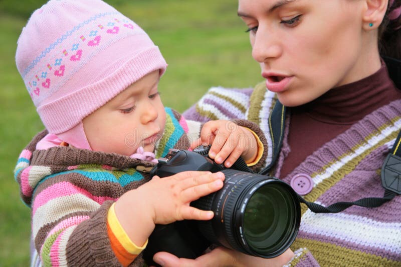 Baby with camera stock image. Image of background, photographer - 2373927