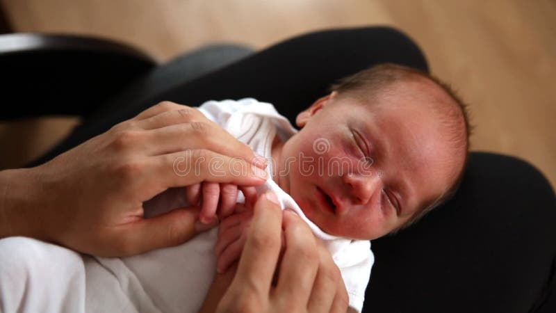 Mother Holds Baby in Her Arms. Stock Video - Video of together, love ... Mother Holds Baby in Her Arms. Stock Video - Video of together, love ...