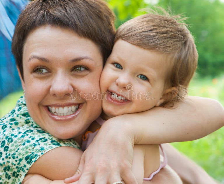 Mother hugging baby stock image. Image of cheerful, portrait - 9684317