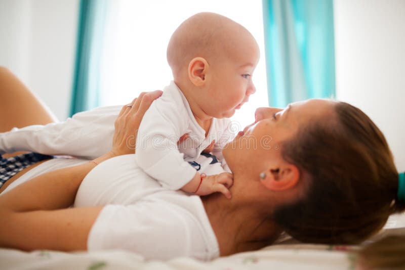 Mother hugging baby stock image. Image of baby, young - 43414627