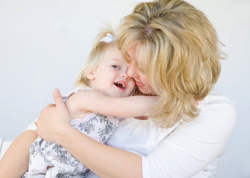 Mother Hugging Child stock photo. Image of hugging, faces - 8359274