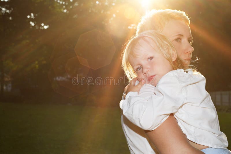 Mother Hugging Child in Summer Scene Stock Image - Image of park ...