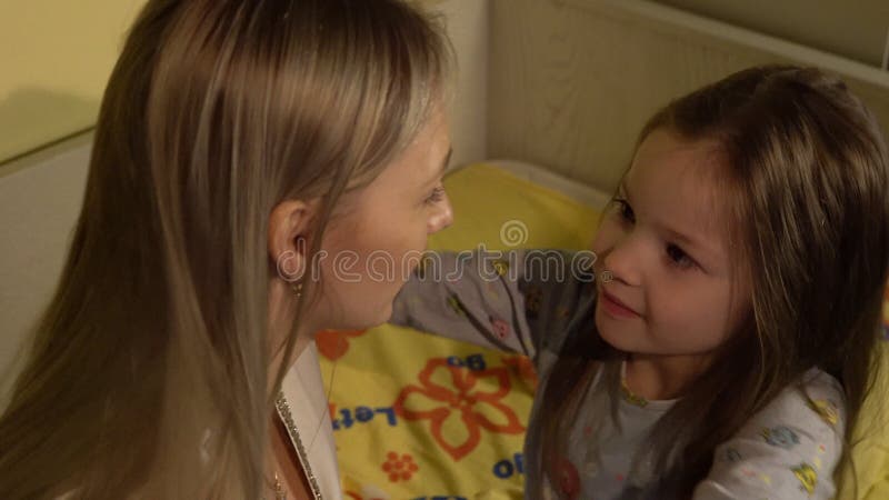 Mother Kissing And Hugging Her Daughter On The Bed Stock Footage Video Of Happy Bedtime