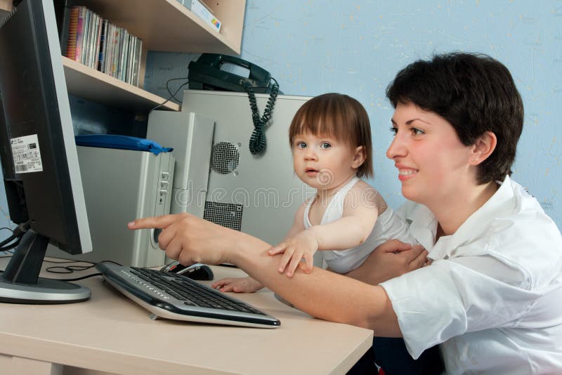 Mother with Little Daughter Working on Computer Stock Image - Image of ...